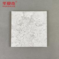China High-Gloss Lightweight WPC Wall Panel with Easy to Clean White Marble Finish for sale