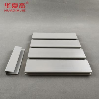 China Customized Length Grey PVC Slatwall Panel with Smooth Surface for Garage Storage for sale