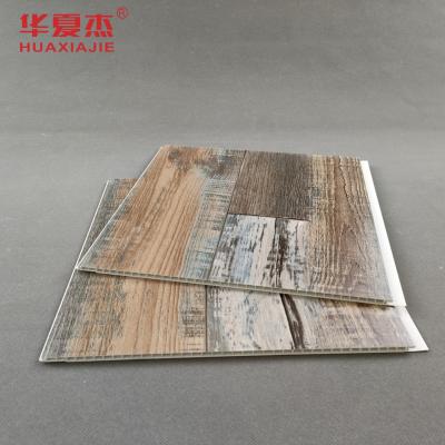 China Modern Design wood grains Pvc Wall Panel 250x5mm Pvc Panel For indoor Room Decor for sale