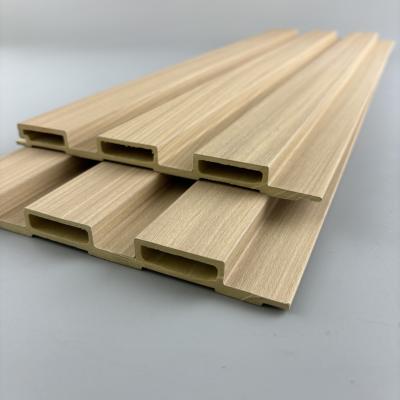 China Laminated Surface WPC Wall Panel Wood grain design WPC fluted panel indoor decoration for sale