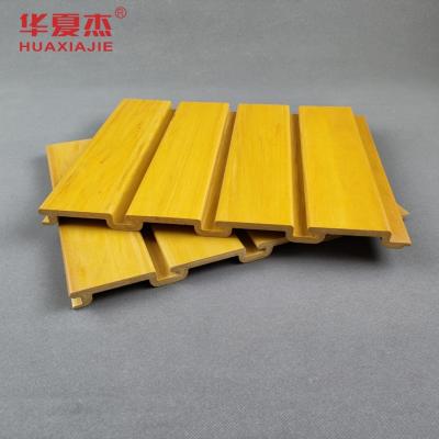 China Wood Grain PVC Slatwall Smooth Surface Panels Providing Durable Retail Display Walls and Functional Storage Solutions for sale