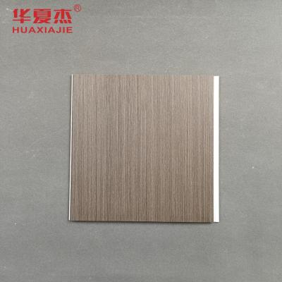 China Waterproof PVC Wall Panels wood grains laminated wall panels pvc indoor wall design for sale