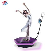 China Portable Revolve 360 Photo Booth Camera Holder With Light Video For Taking Photos for sale
