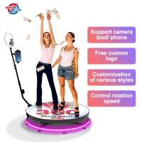 China Portable Revolve 360 Photo Booth Camera Holder With Light Video For Taking Photos for sale