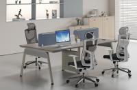 China Functional 4 Person Office Workstation with Wood Grain Desktop and Metal Legs for Coworking Spaces for sale