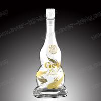 China 700ml Twisted Vodka Glass Bottle With Bright Closure for sale