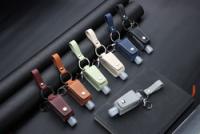China Factory Custom Promotion Gift portable bottle holder Leather Hand Sanitizer Holder Keychain for sale
