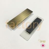 China wholesale gold plated labels engrave concave custom embossed brand name logo tags metal name tag with magnet for sale