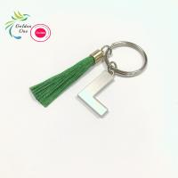 China Handbag Charms Tassel Keyring English Letter Shiny Silver Plated Metal Key Chain for sale