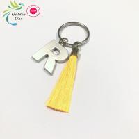 China Handbag Charms Tassel Keyring English Letter Shiny Silver Plated Metal Key Chain for sale