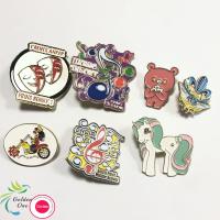 China Metal Customized Shiny Gold Plated Enamel Lapel Pins with UV and Silk Screen Print for sale