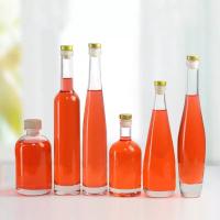 China Custom Glass Bottle for Juice 750ml 1000ml 1500ml Empty Transparent PET Fruit Juice Beverage Bottle for sale