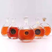 China Glass Flat Round Fan Shaped Xo Brandy Bottle Clear White Wave Surface Spirits Liquor Bottle with Cork for sale