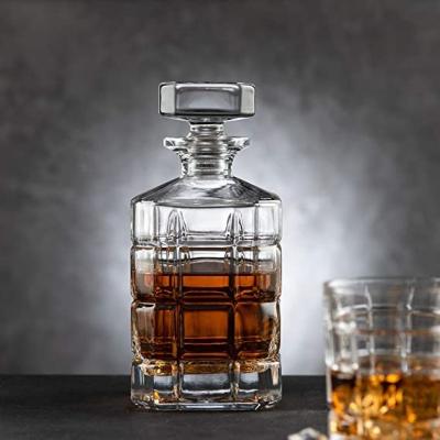 China Round Glass Stopper Bourbon Whiskey Bottle for Cosmetics Engraved Design 30oz Capacity for sale