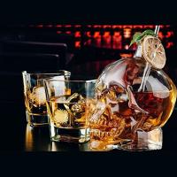 China Custom Color 750 ml Lead-free Skull Glass Bottle with Cork Stopper Lead-free Material for sale