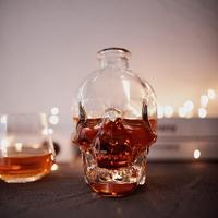 China Custom Color 750 ml Lead-free Skull Glass Bottle with Cork Stopper Lead-free Material for sale