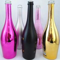 China Custom Glass Bottle Round 750ml Empty Gold Plated Champagne Bottle for sale