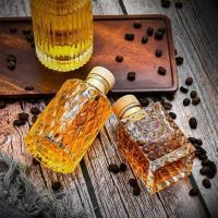 China Glass Bottle With Cork For Vodka Whiskey Liquor Industrial Cosmestic Round Shape for sale