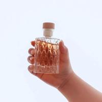 China Glass Bottle With Cork For Vodka Whiskey Liquor Industrial Cosmestic Round Shape for sale