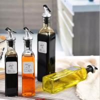 China Custom Glass Bottle 650ml 330 Clear Glass Olive Oil Dispenser Bottle with Cap Olive Oil for sale