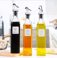 China Custom Glass Bottle 650ml 330 Clear Glass Olive Oil Dispenser Bottle with Cap Olive Oil for sale