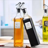 China Custom Glass Bottle 650ml 330 Clear Glass Olive Oil Dispenser Bottle with Cap Olive Oil for sale