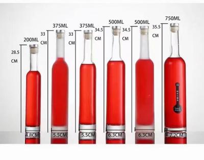 China 280ml Capacity Transparent Glass Whisky Bottle with Decal Surface Handling and Cork for sale