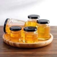 China Custom Color Glass Hexagonal Jar For Cream Honey 45ml 180ml 500ml 700ml for sale