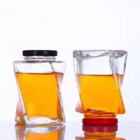 China Vodka Storage Glass Jar with 330ml Capacity and Metal Cover for sale