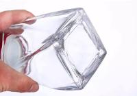 China Vodka Storage Glass Jar with 330ml Capacity and Metal Cover for sale