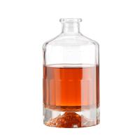 China 150ml Custom Glass Vodka Bottle with Exquisite Embossed and Collar Material Glass for sale