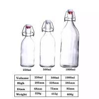 China Round 600ml Glass Bottle With Stopper Caps Carafe Swing Top Beer Bottle Kombucha Bottle Beverage for sale