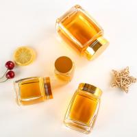 China 180ml 500ml 700ml Round Glass Cream Honey Jar with Round Shape and Glass Material for sale