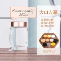 China 180ml 500ml 700ml Round Glass Cream Honey Jar with Round Shape and Glass Material for sale