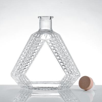 China Collar Material Glass 100ml Triangle Shape Vodka Bottle for Screen Printing for sale