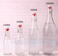 China Glass Bottle Sealing Type Cork 150ml 250ml 500ml 1000ml Round Shape Swing Top Wine Whiskey Bottles for sale