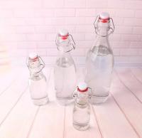 China Glass Bottle Sealing Type Cork 150ml 250ml 500ml 1000ml Round Shape Swing Top Wine Whiskey Bottles for sale
