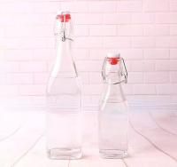 China Glass Bottle Sealing Type Cork 150ml 250ml 500ml 1000ml Round Shape Swing Top Wine Whiskey Bottles for sale