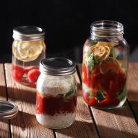 China Glass Sealed Storage Tank Round Bottle For Pickles And Mason Jar for sale