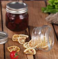 China Glass Sealed Storage Tank Round Bottle For Pickles And Mason Jar for sale