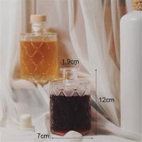 China Round 200 ml 500 ml 700 ml Glass Bottle for Whisky Vodka Wine Carving Cork Juice Milk Tea Drink for sale