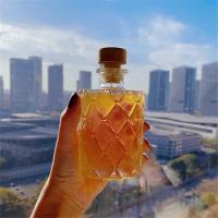China Round 200 ml 500 ml 700 ml Glass Bottle for Whisky Vodka Wine Carving Cork Juice Milk Tea Drink for sale