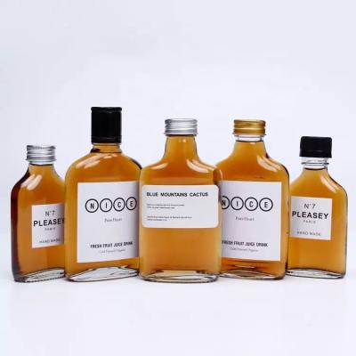 China 50ml 100ml 200ml 250ml 500ml Clear Glass Flat Wine Bottle for Cold Brew Coffee Juice for sale