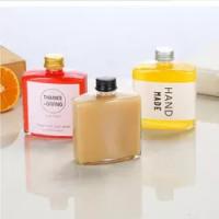 China 50ml 100ml 200ml 250ml 500ml Clear Glass Flat Wine Bottle for Cold Brew Coffee Juice for sale
