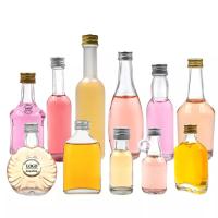 China Body Material Glass 30ml 40ml 50ml 100ml Mini Bottle for Beverage Juice Wine Spirit Liquor for sale