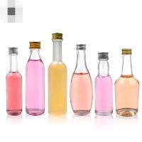 China Body Material Glass 30ml 40ml 50ml 100ml Mini Bottle for Beverage Juice Wine Spirit Liquor for sale