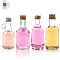 China Body Material Glass 30ml 40ml 50ml 100ml Mini Bottle for Beverage Juice Wine Spirit Liquor for sale