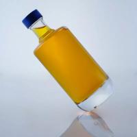 China Round Shape Empty Glass Bottle With Screw Cap Decal Surface for 700 ml Vodka Bottle for sale