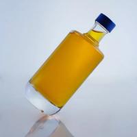 China Round Shape Empty Glass Bottle With Screw Cap Decal Surface for 700 ml Vodka Bottle for sale