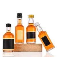 China Collar Material 50ml Small Luxury Wine Bottle for Vodka Whisky Customized Design for sale
